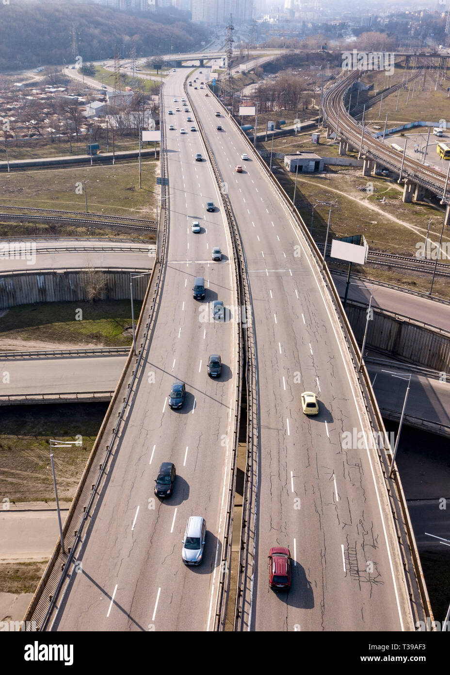 Aerial view from drone traffic overpass with moving cars on an asphalt ...