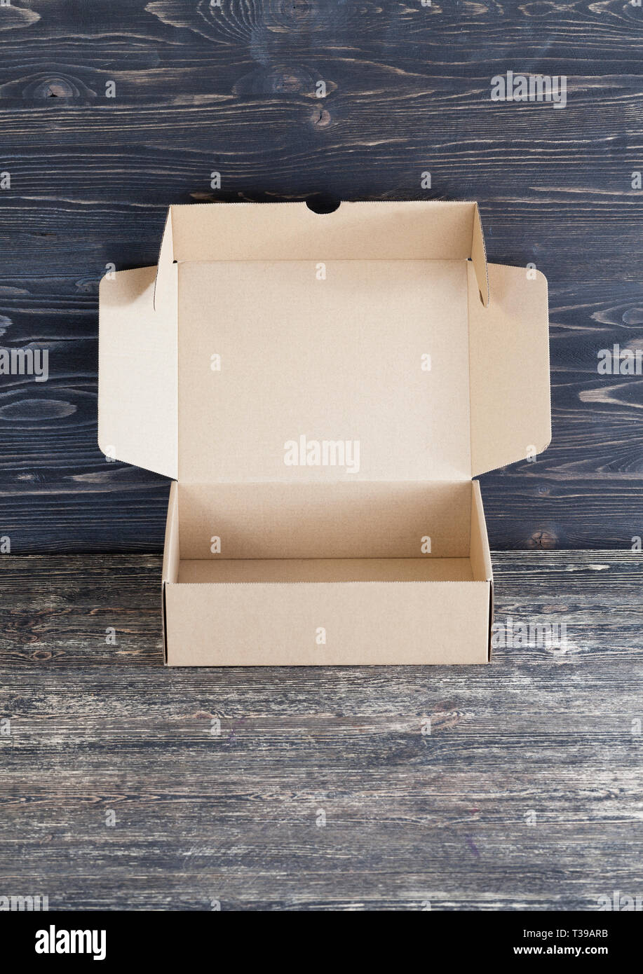 A simple open cardboard box made from recycled paper waste paper Stock ...