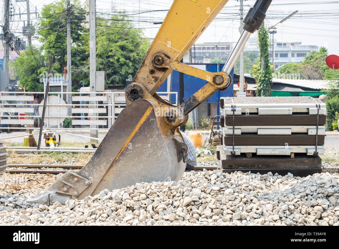 Large backhoe heavy dig soil stone brown Stock Photo - Alamy