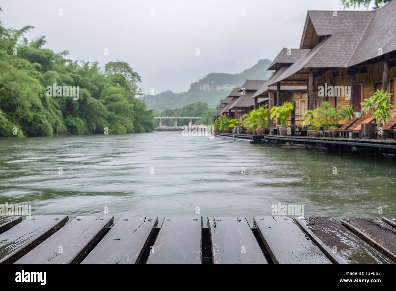 Wooden plank raft on blurred scene resort in natural Stock Photo - Alamy