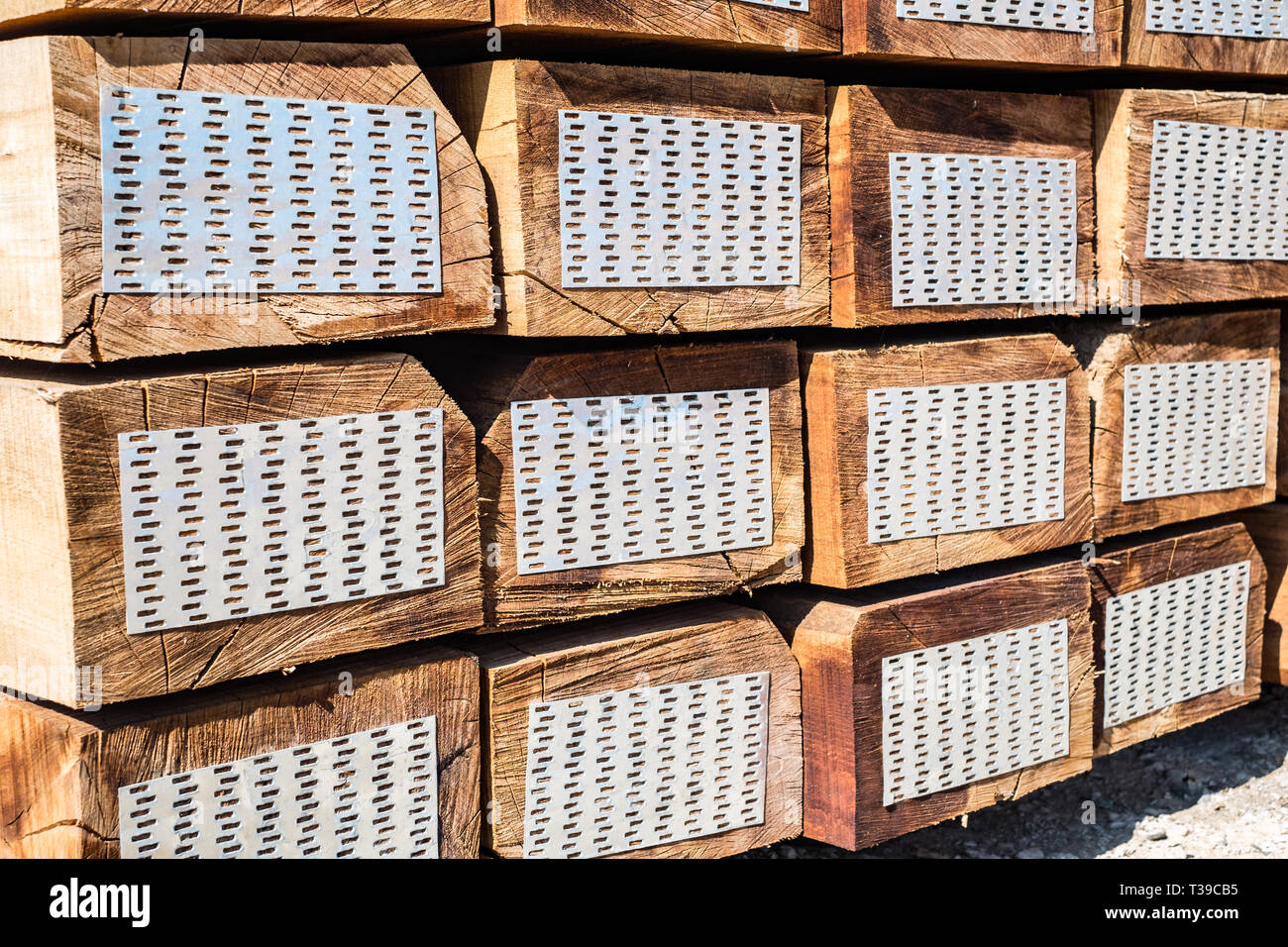 stacked of new wooden railway sleepers Stock Photo - Alamy
