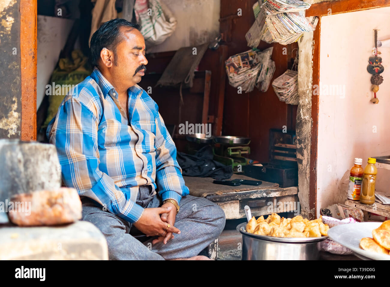 Varanasi, India, Mar 10 2019 - Indian street food vendors cooks ...