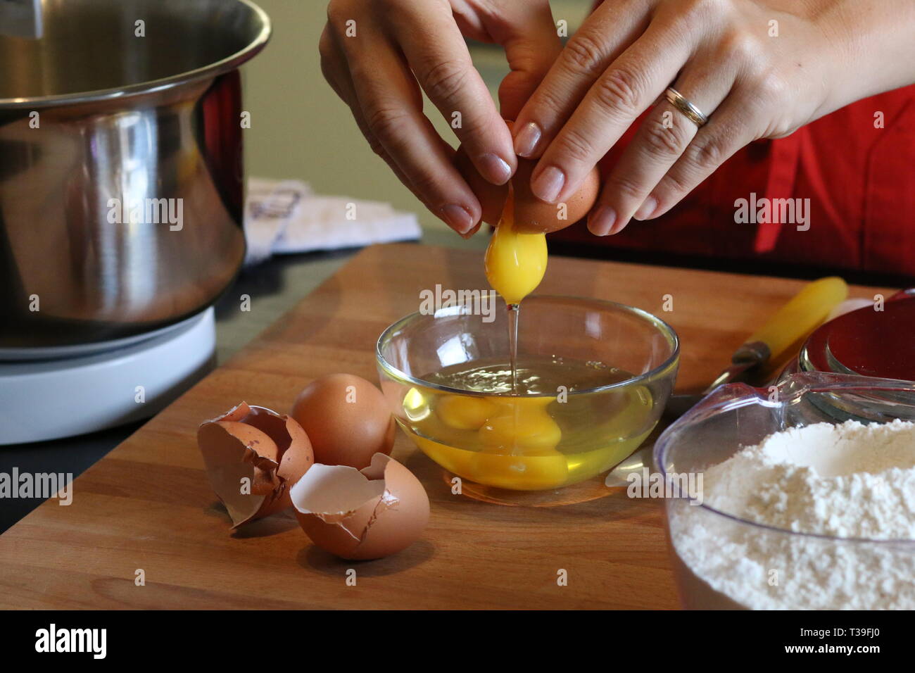 Woman cooking cake Stock Photo - Alamy