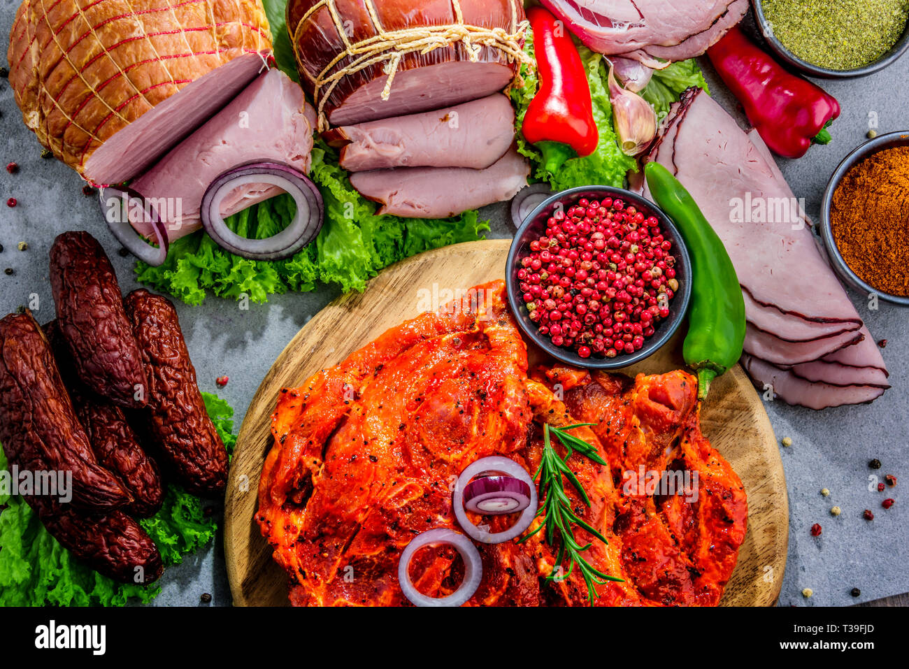 Composition with assorted meat products including ham, sausage and ...