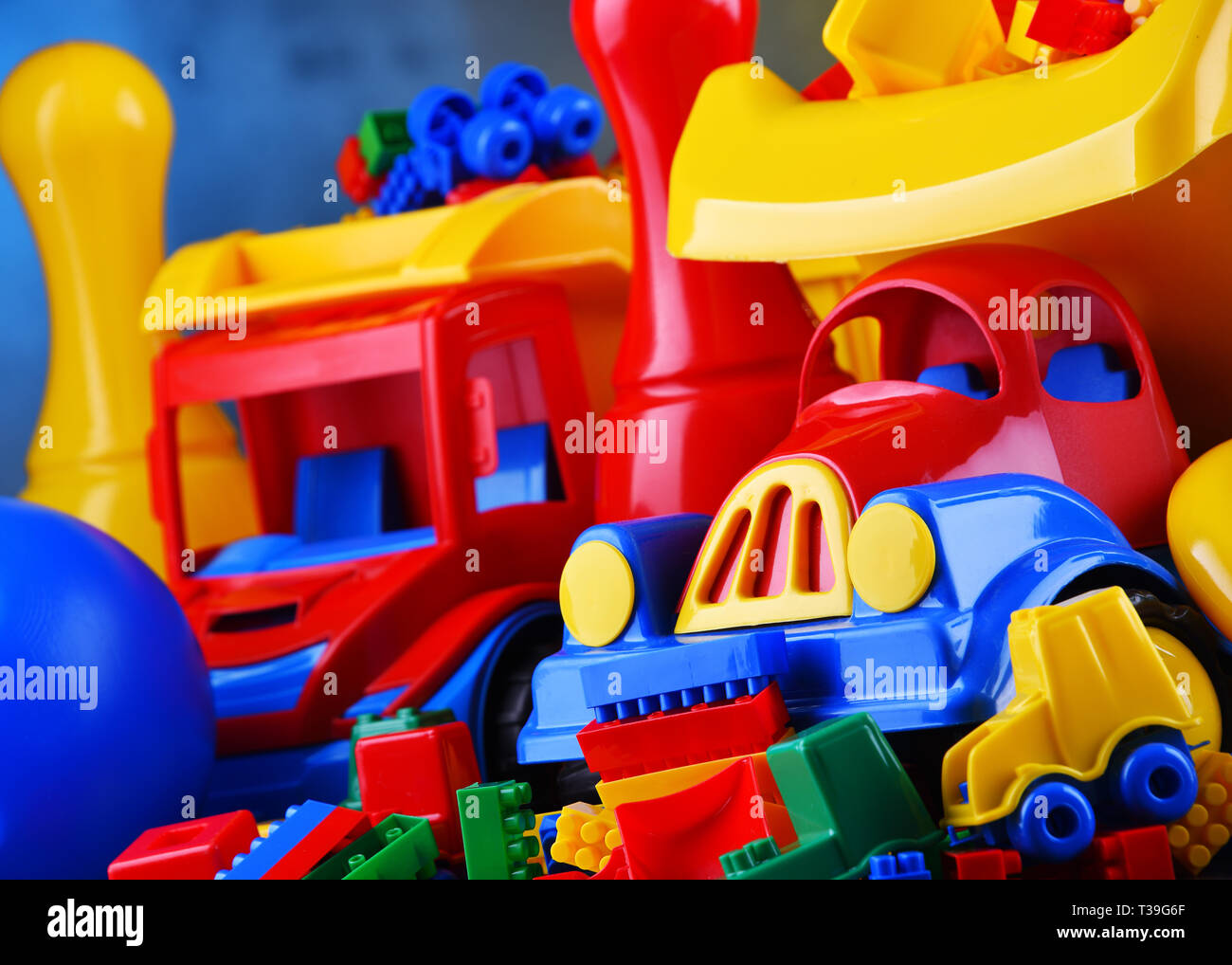 Composition with colorful plastic children toys Stock Photo - Alamy