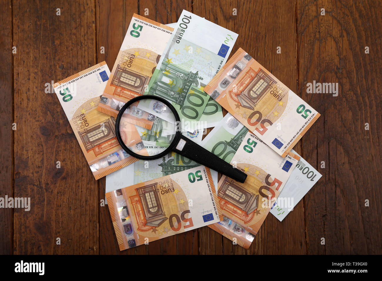 Dollar banknote under magnifying hi-res stock photography and images ...
