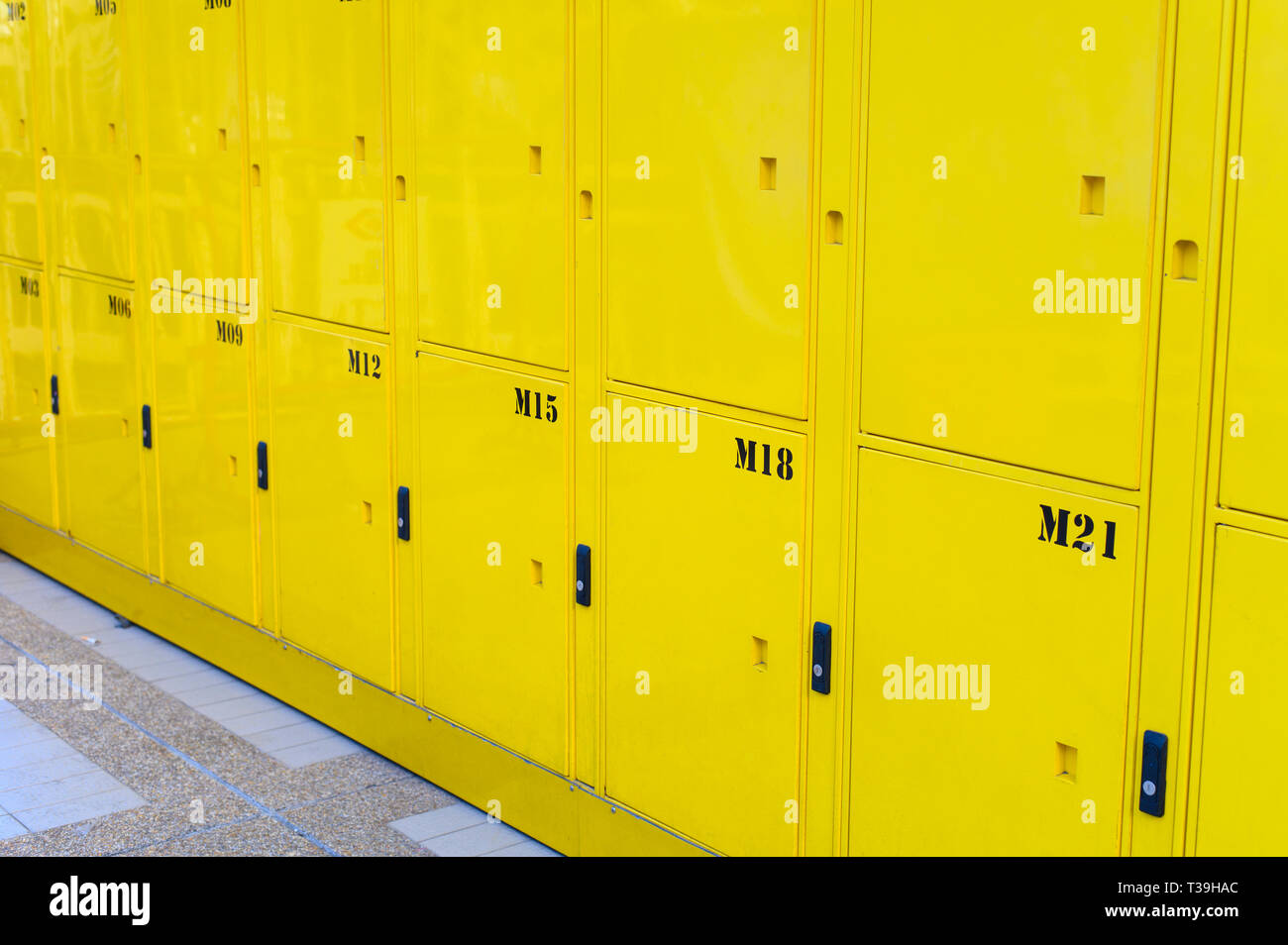 Close up on yellow lockers door at public locker service Stock Photo ...