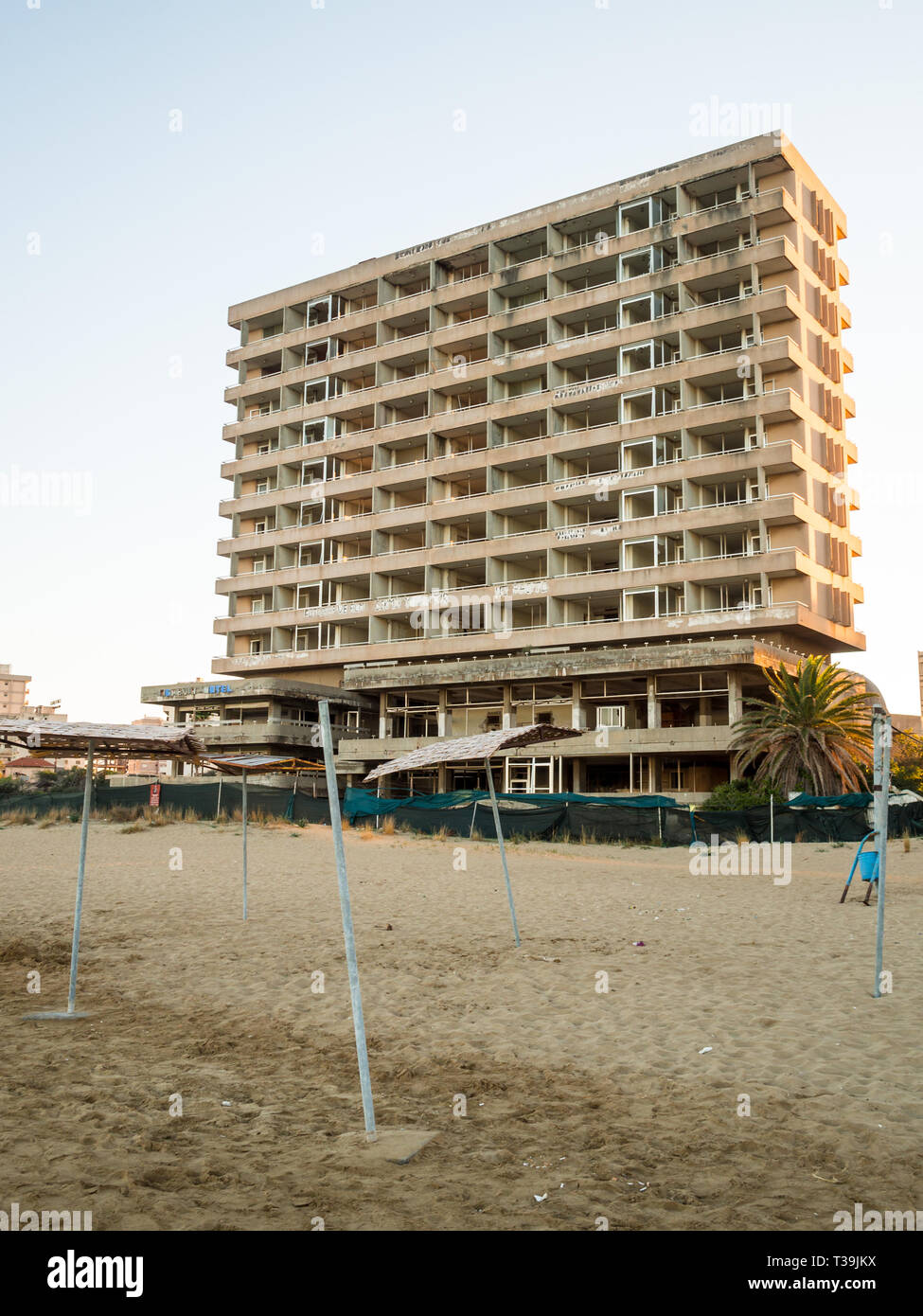 North Cyprus ghost city of Gazimagusa apartment block by the beach ...