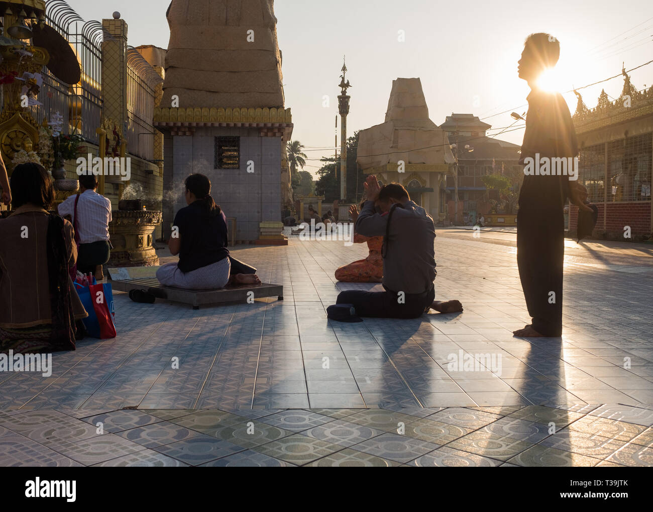 Devotees praying at the Botataung Pagoda, Yangon, Myanmar (Burma Stock ...