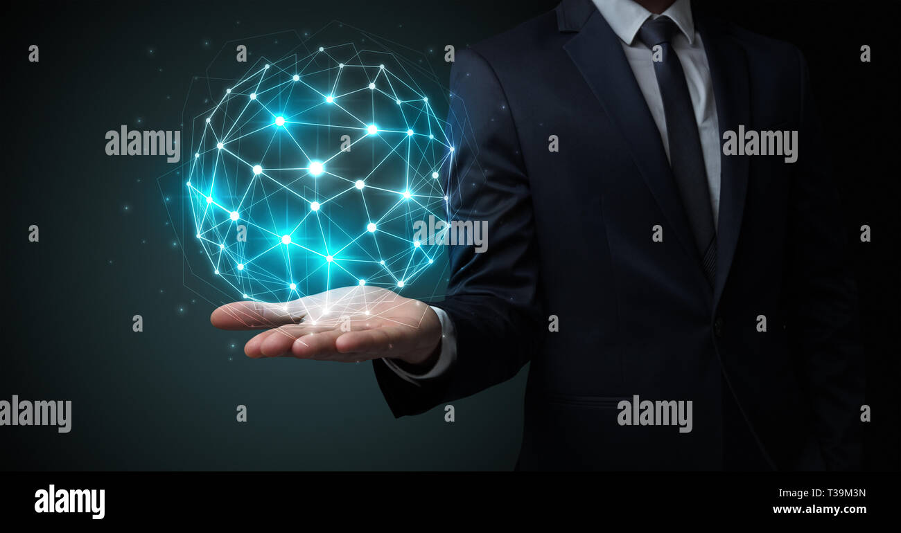 Businessman in suit holding global connection symbol on his hand Stock ...