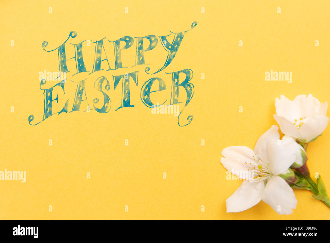 Happy Easter text. Message in hand written font Stock Photo - Alamy
