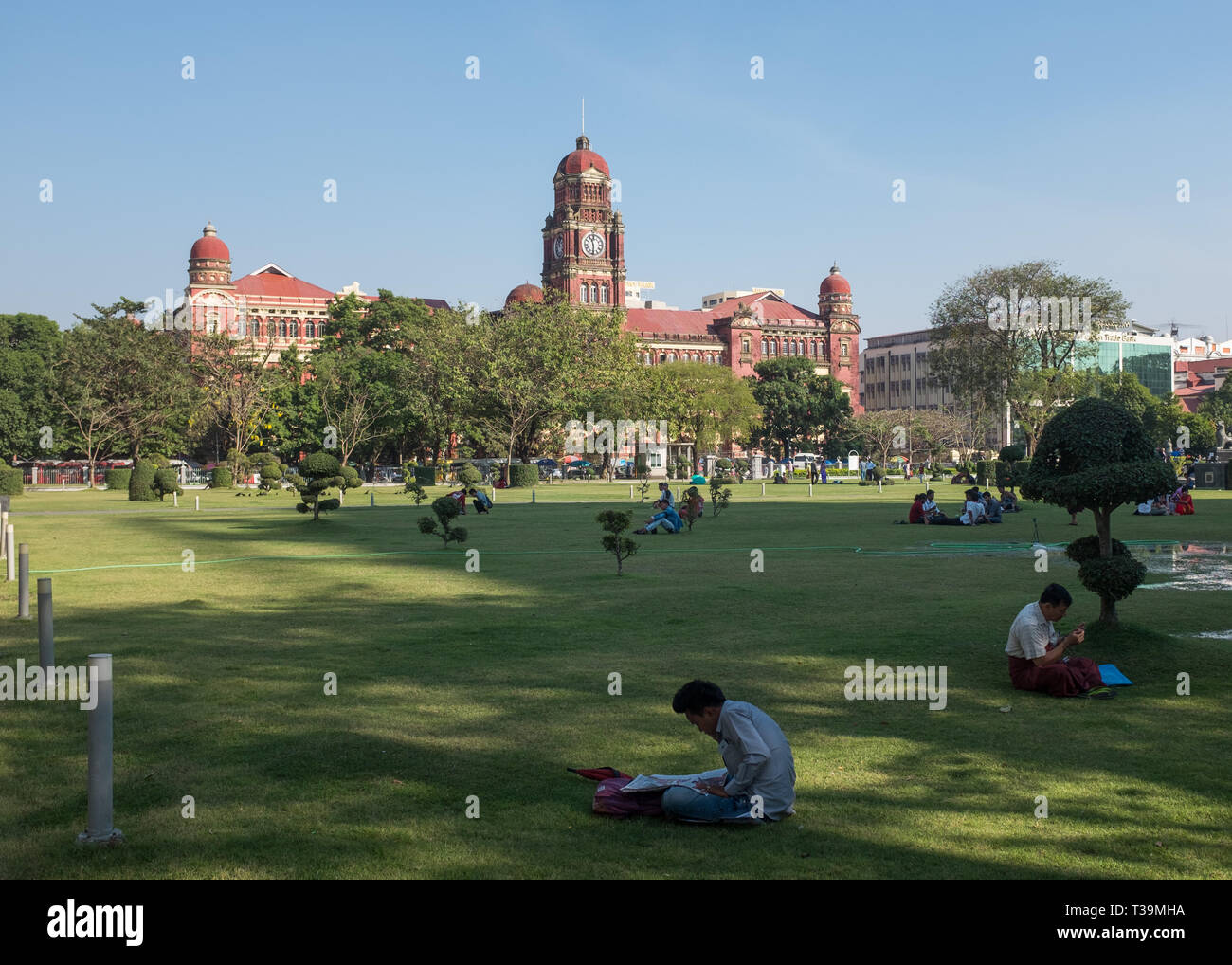 Maha Bandoola Garden and the brick Queen Anne-style building, the High ...