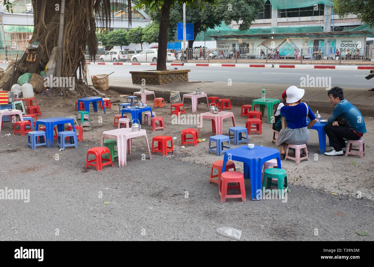Group of woman plastic chairs hi-res stock photography and images - Alamy