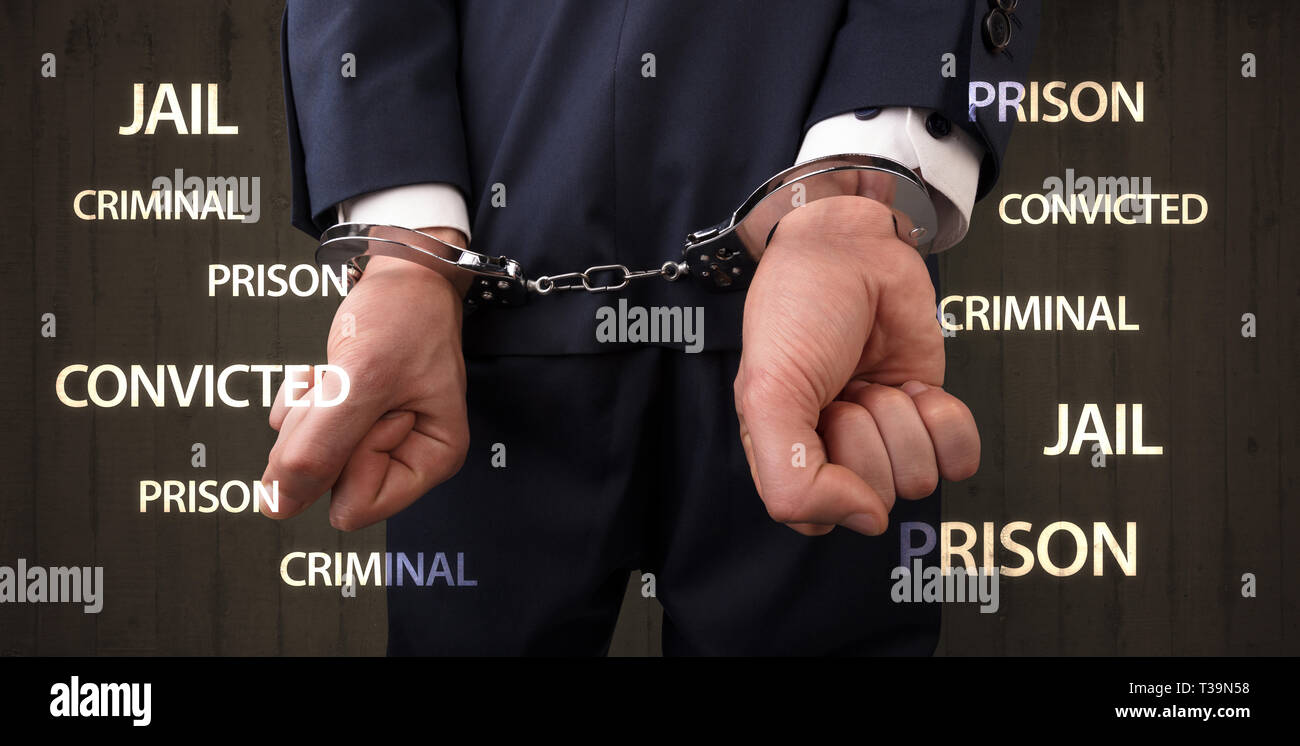 Jail convicted prison criminal labels with close handcuffed man Stock ...