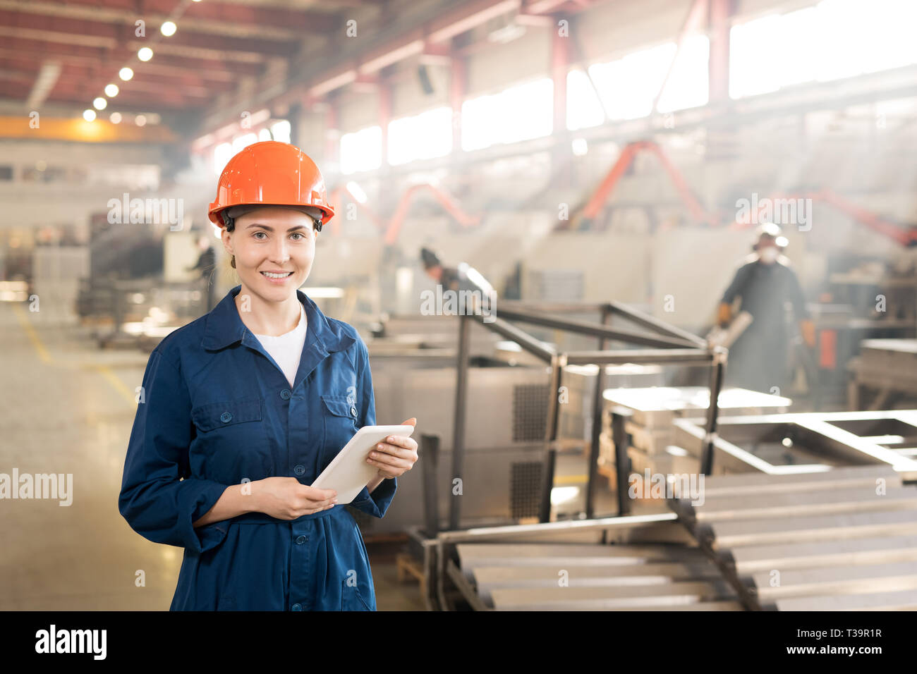 Woman industrial workplace hi-res stock photography and images - Alamy
