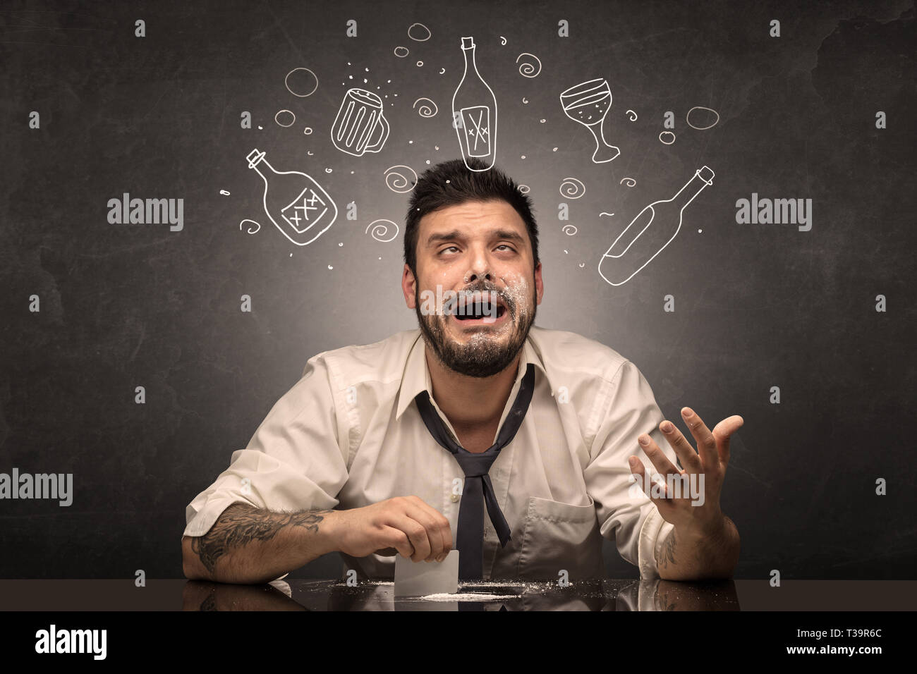 Drunk down and out man with doodle alcohol bottles concept Stock Photo ...