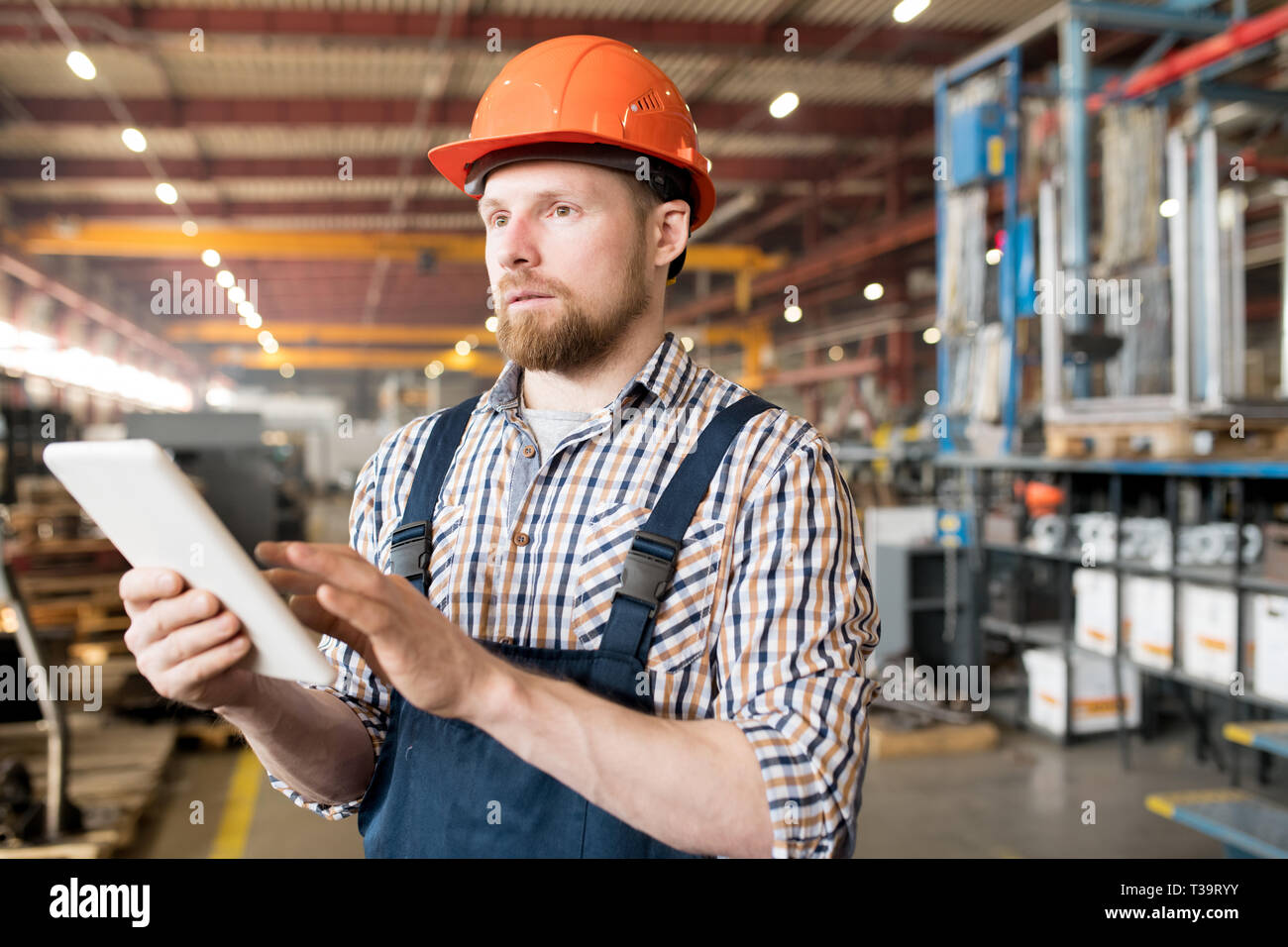 Engineer in factory Stock Photo - Alamy