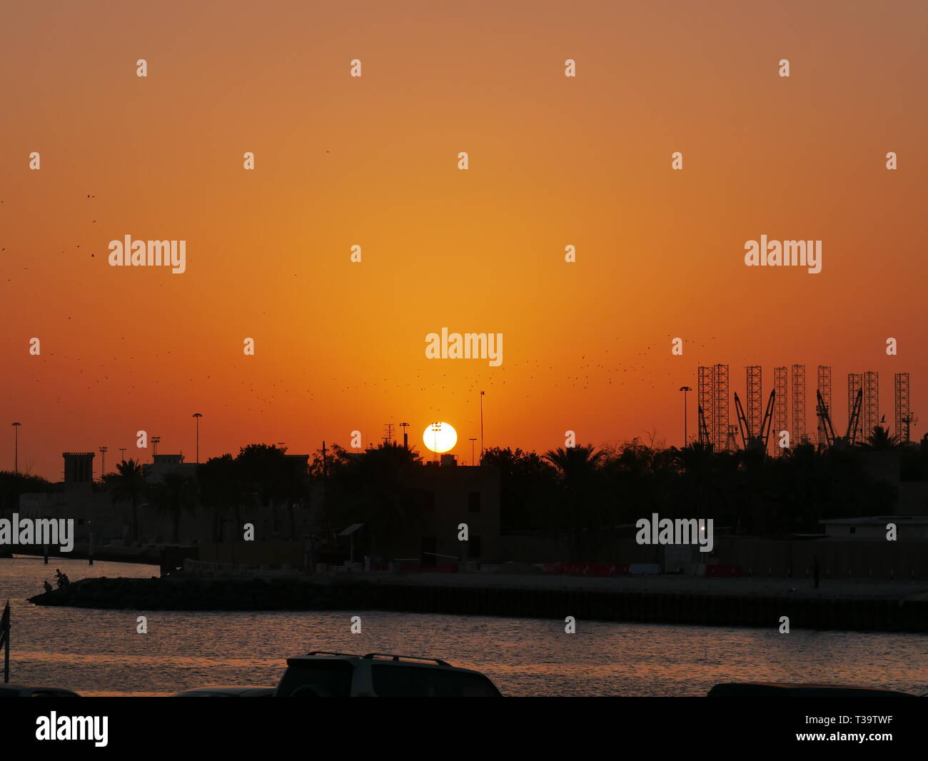 Sunset at the arabic harbour Stock Photo - Alamy
