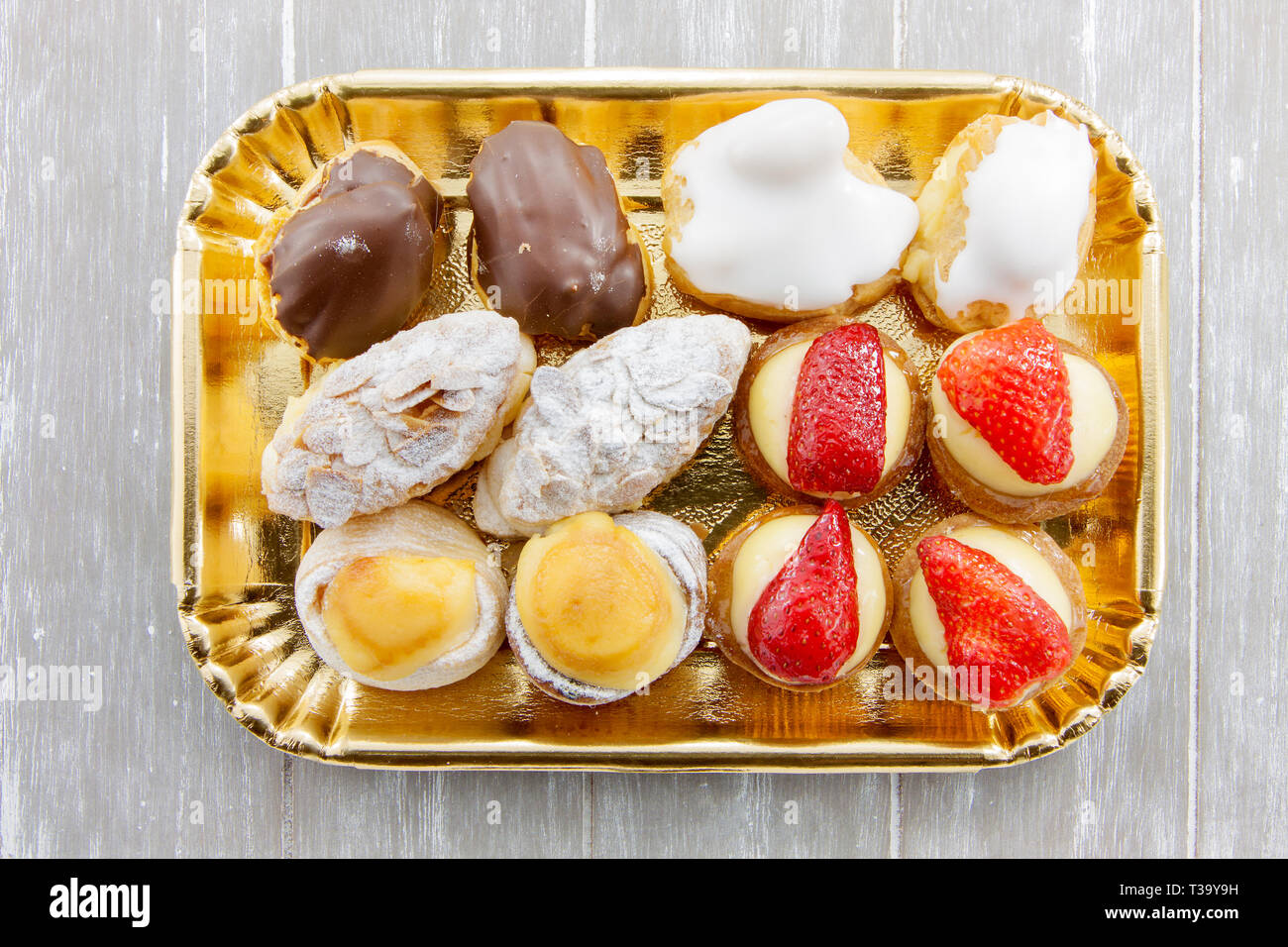 Tray of assorted cakes Stock Photo - Alamy