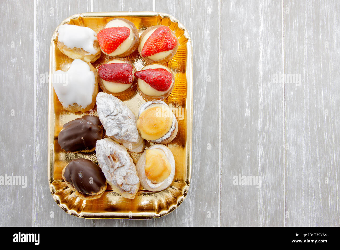 Tray of assorted cakes Stock Photo - Alamy