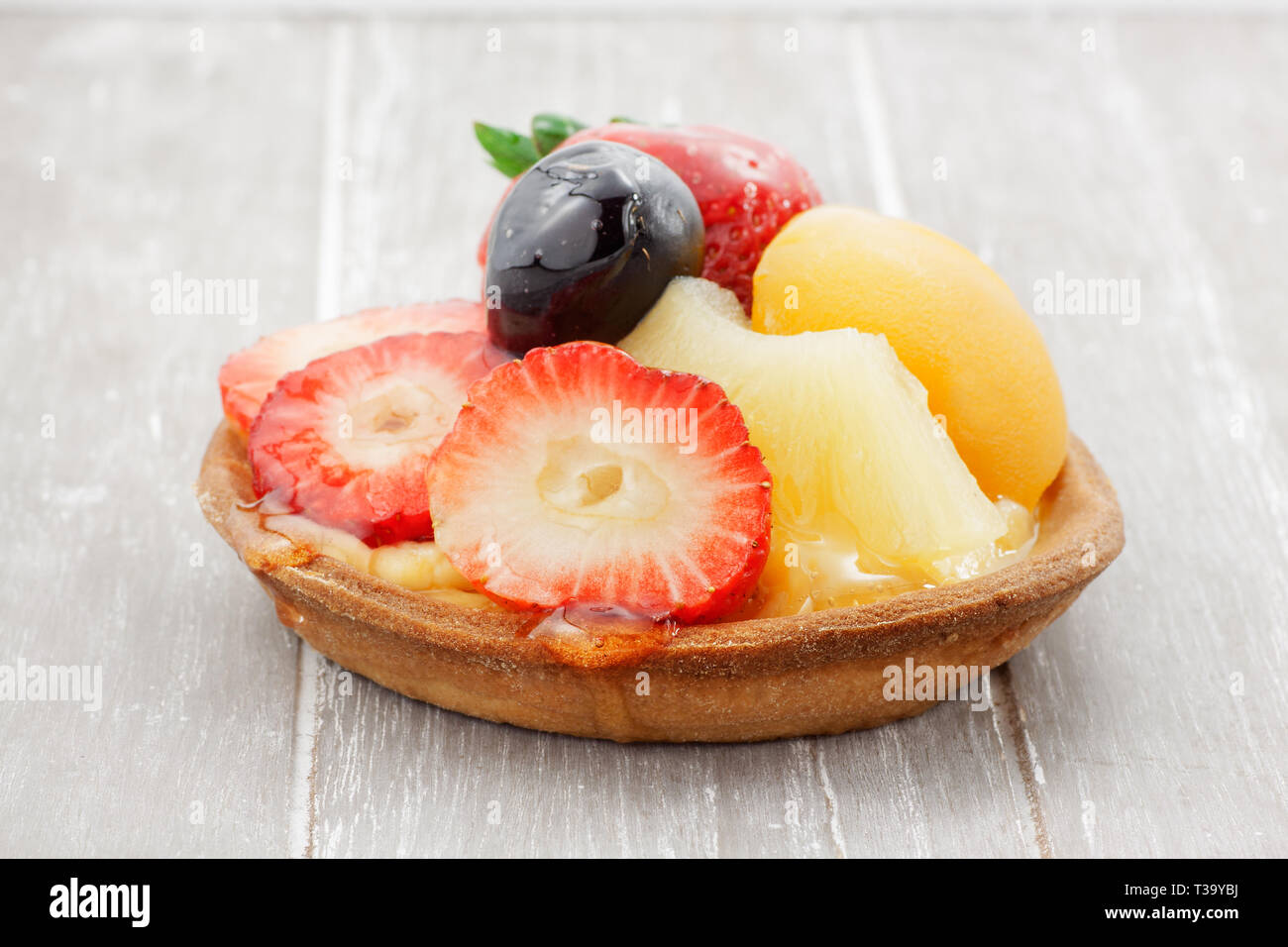 Mini fruit cake with syrup Stock Photo - Alamy