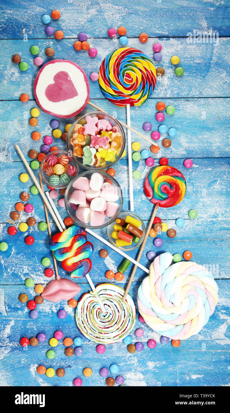 candies with jelly and sugar. colorful array of different childs sweets ...