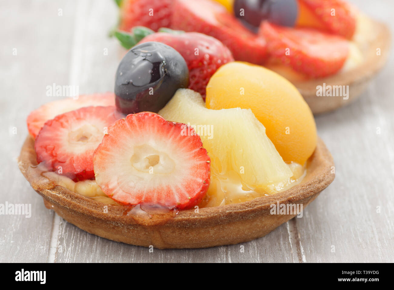 Mini fruit cake with syrup Stock Photo - Alamy