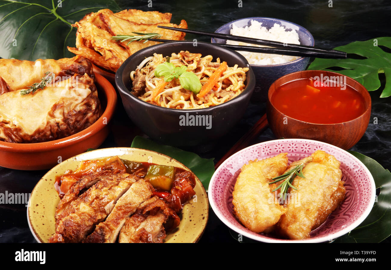 Assorted Chinese food set. Chinese noodles, fried rice, peking duck ...