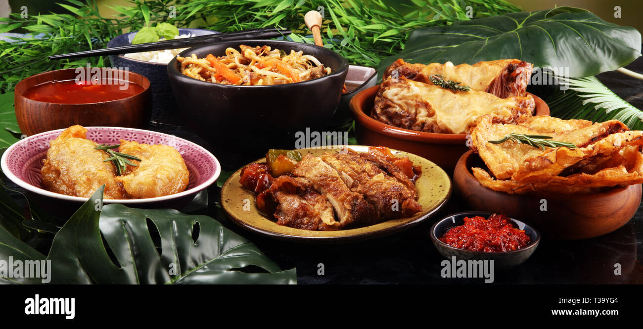 Assorted Chinese food set. Chinese noodles, fried rice, peking duck ...