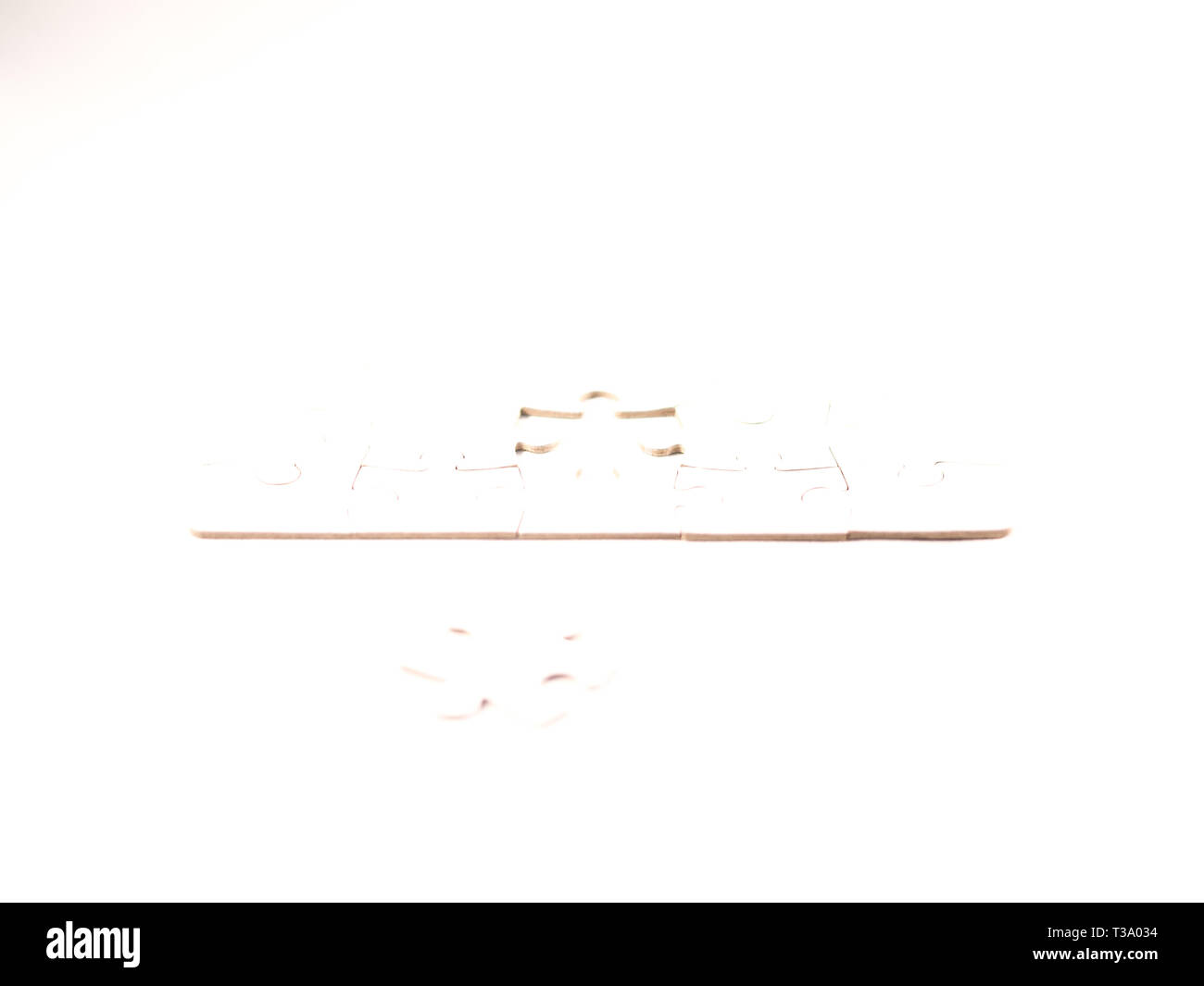white jigsaw/puzzle whit one gap, symbol of problem solving Stock Photo ...