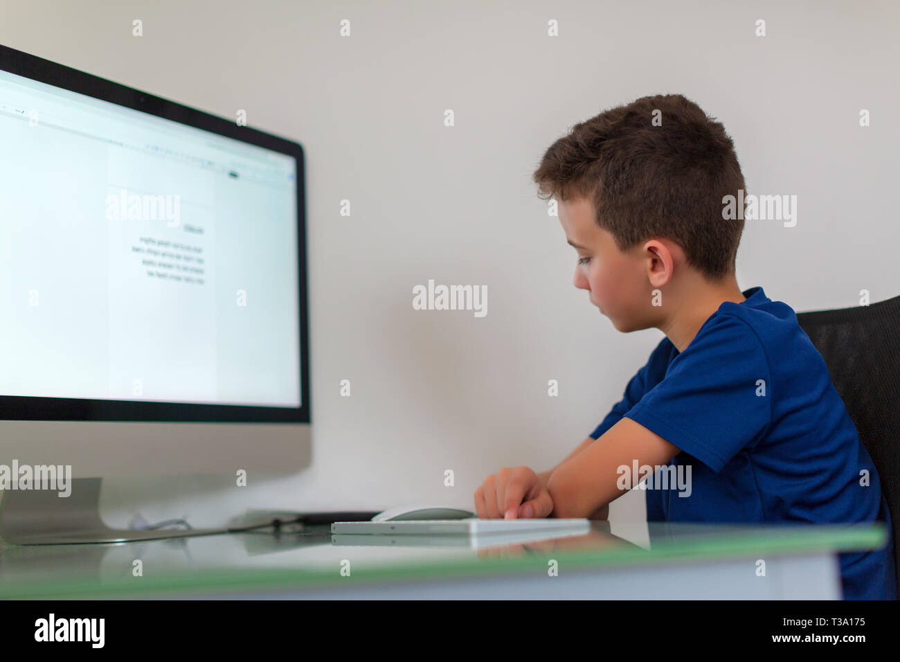 Teen boy school work hi-res stock photography and images - Alamy