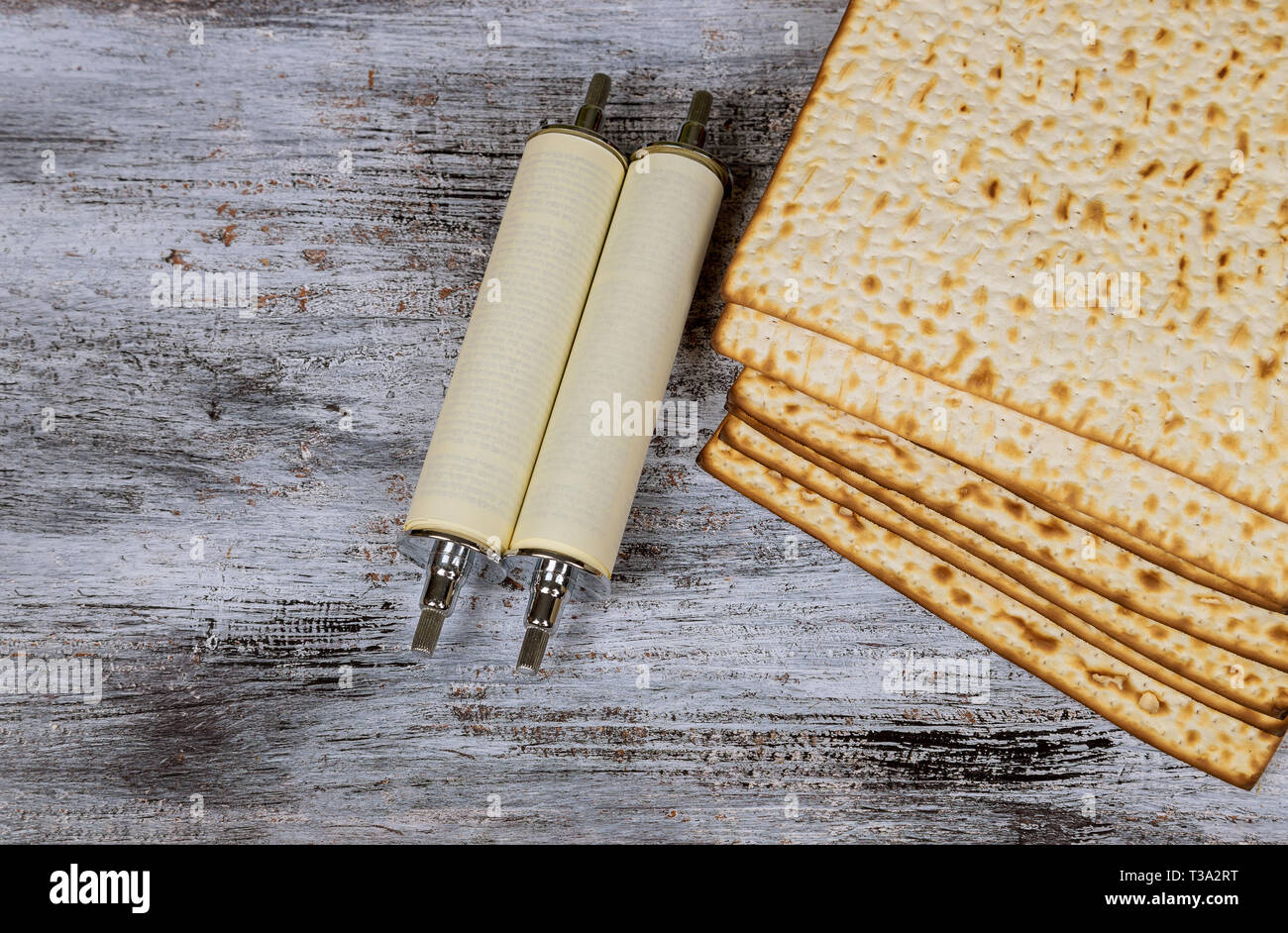 Jewish matza on Passover Torah scroll detail Stock Photo - Alamy
