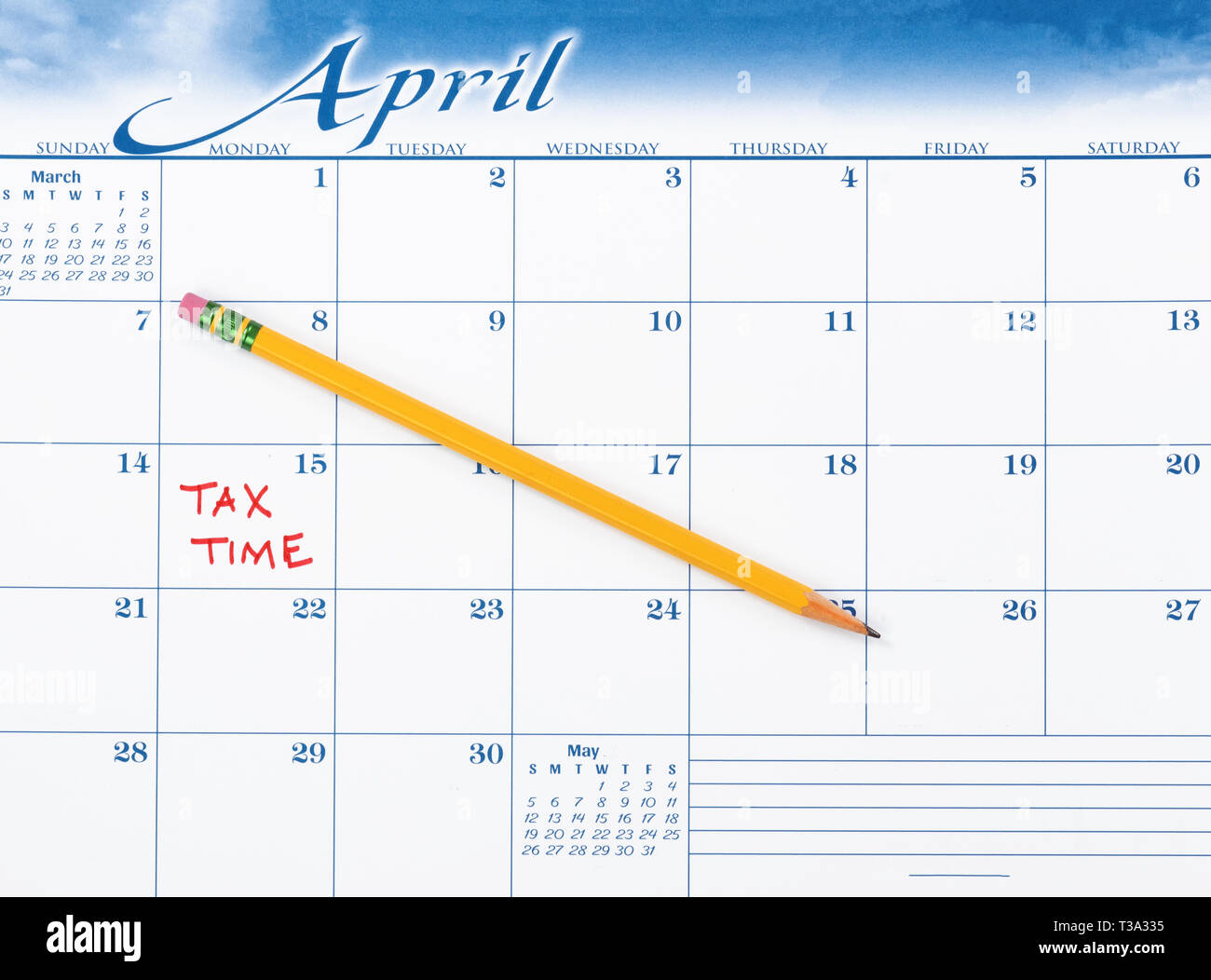 Tax due date marked on calendar with single pencil Stock Photo - Alamy