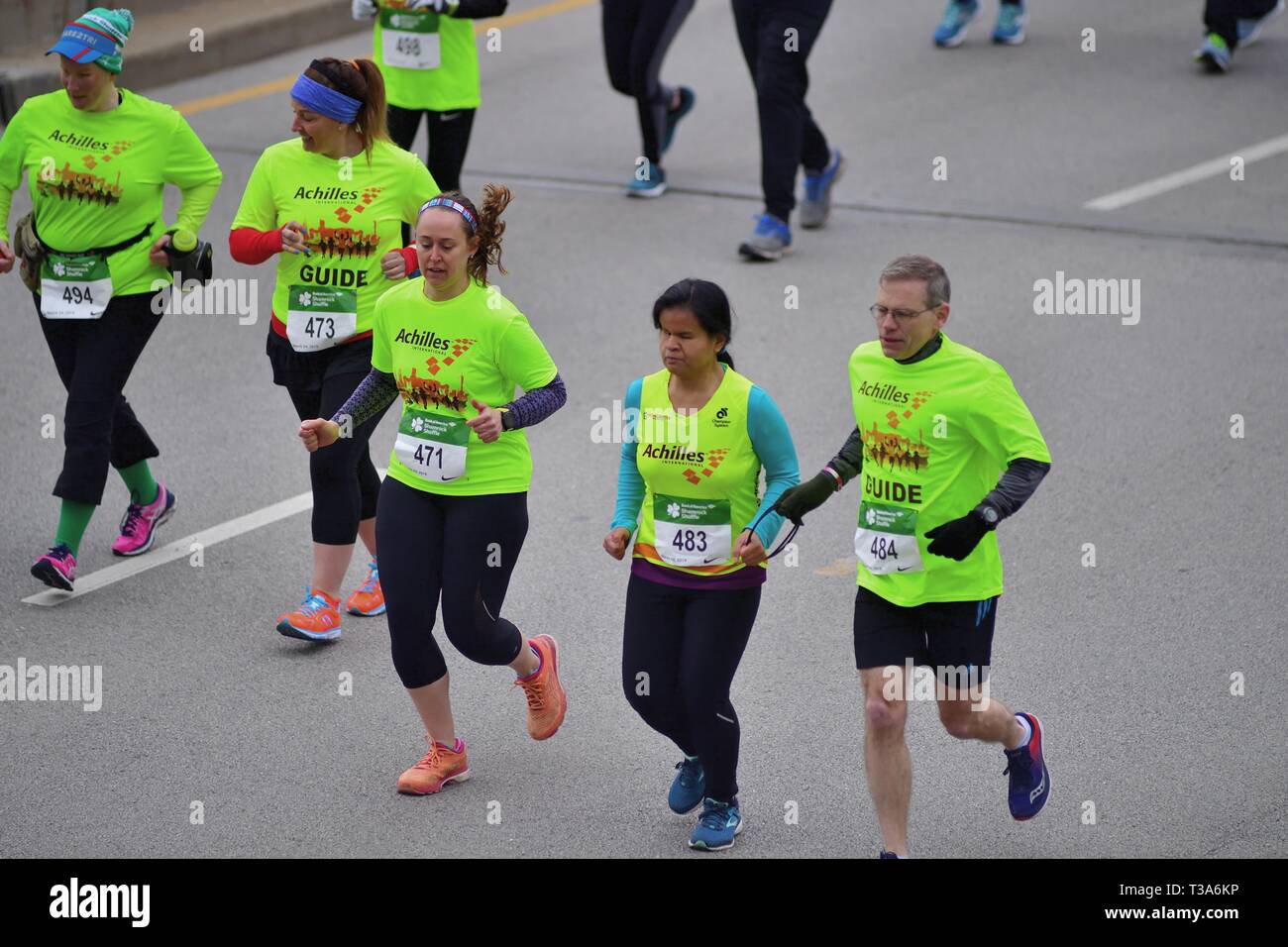 Chicago, Illinois, USA.Vision-impaired runners along with their guides ...