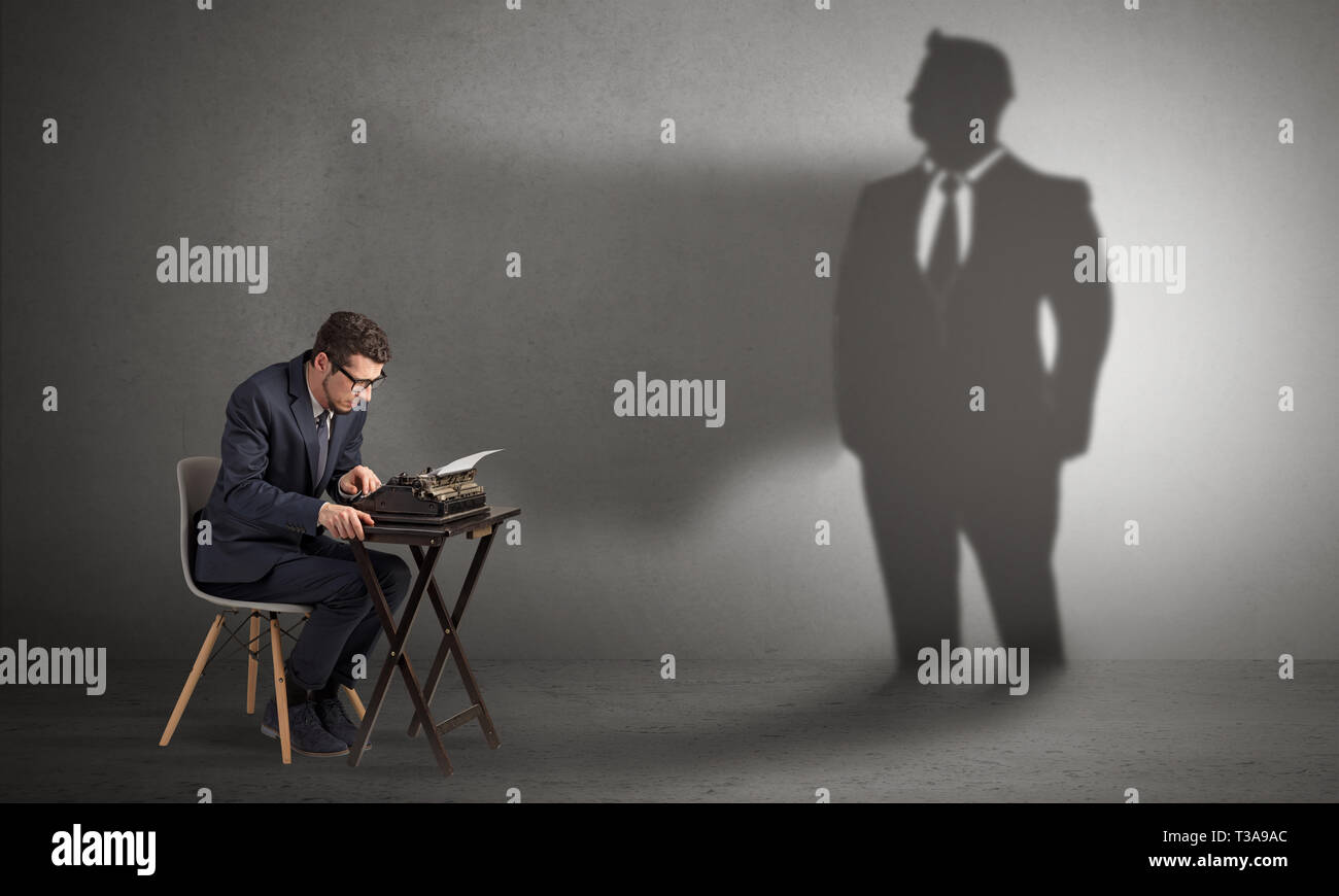 Shadow threatening hard worker man who is afraid Stock Photo - Alamy