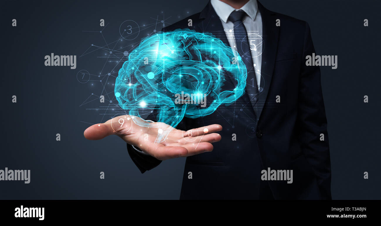 Businessman holding human brain on his hand with logistics symbols ...