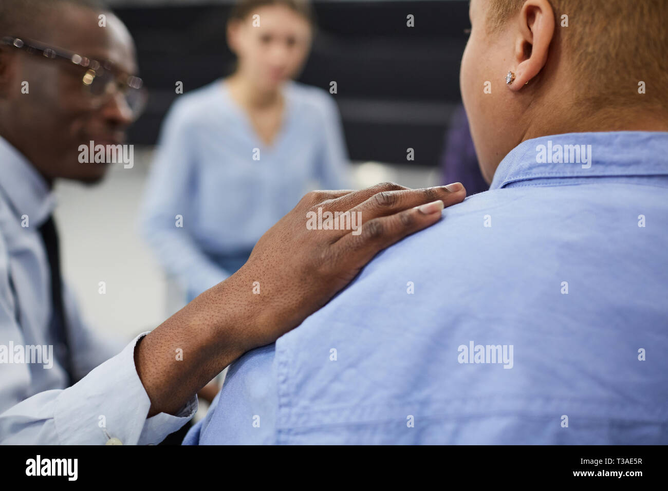Sharing in Support Group Stock Photo - Alamy