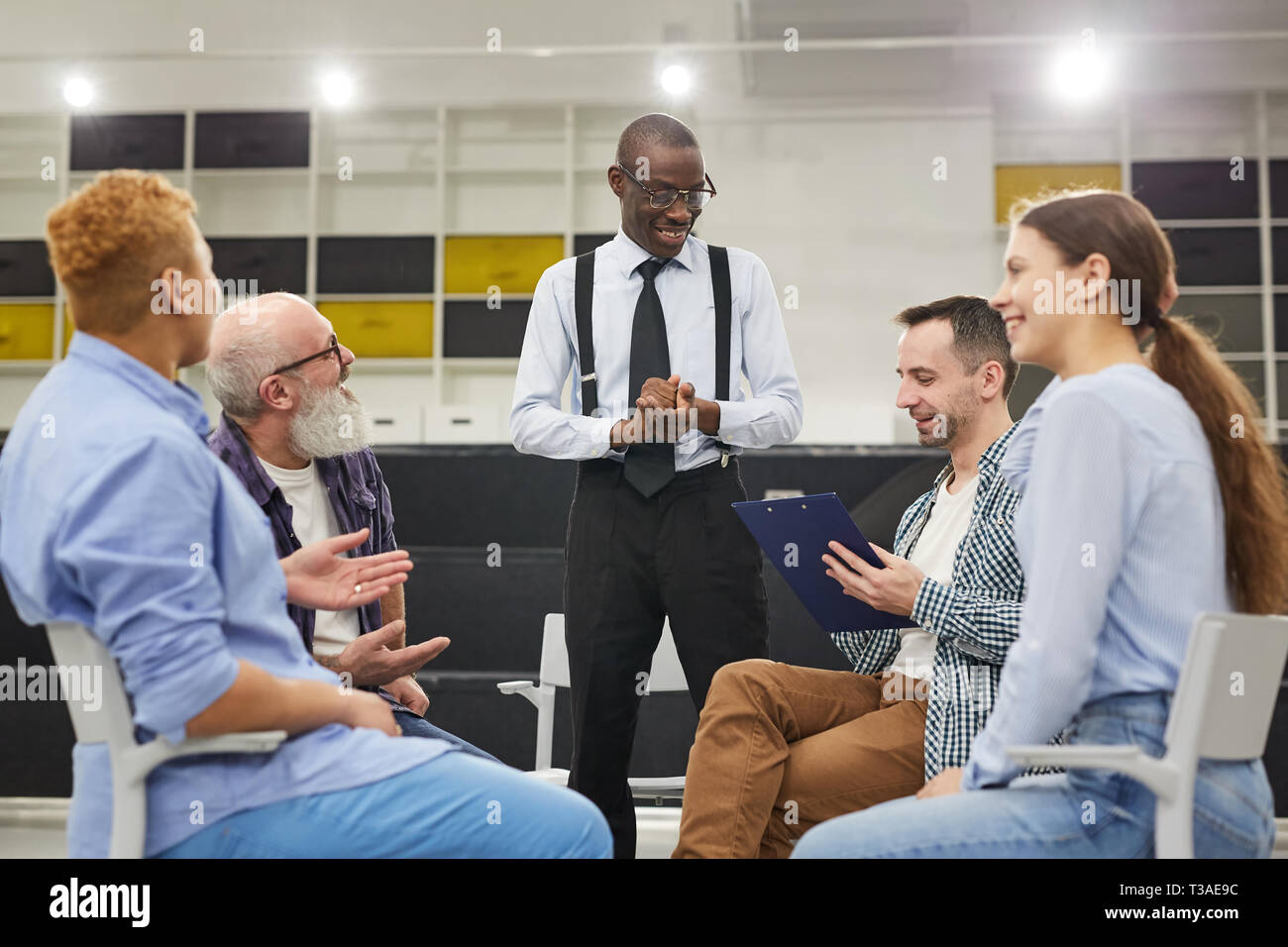 African Man Sharing Success Story Stock Photo - Alamy