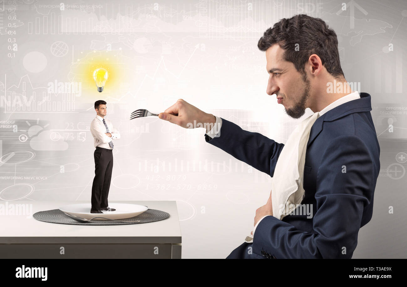 Giant businessman eating small man with financial background Stock ...