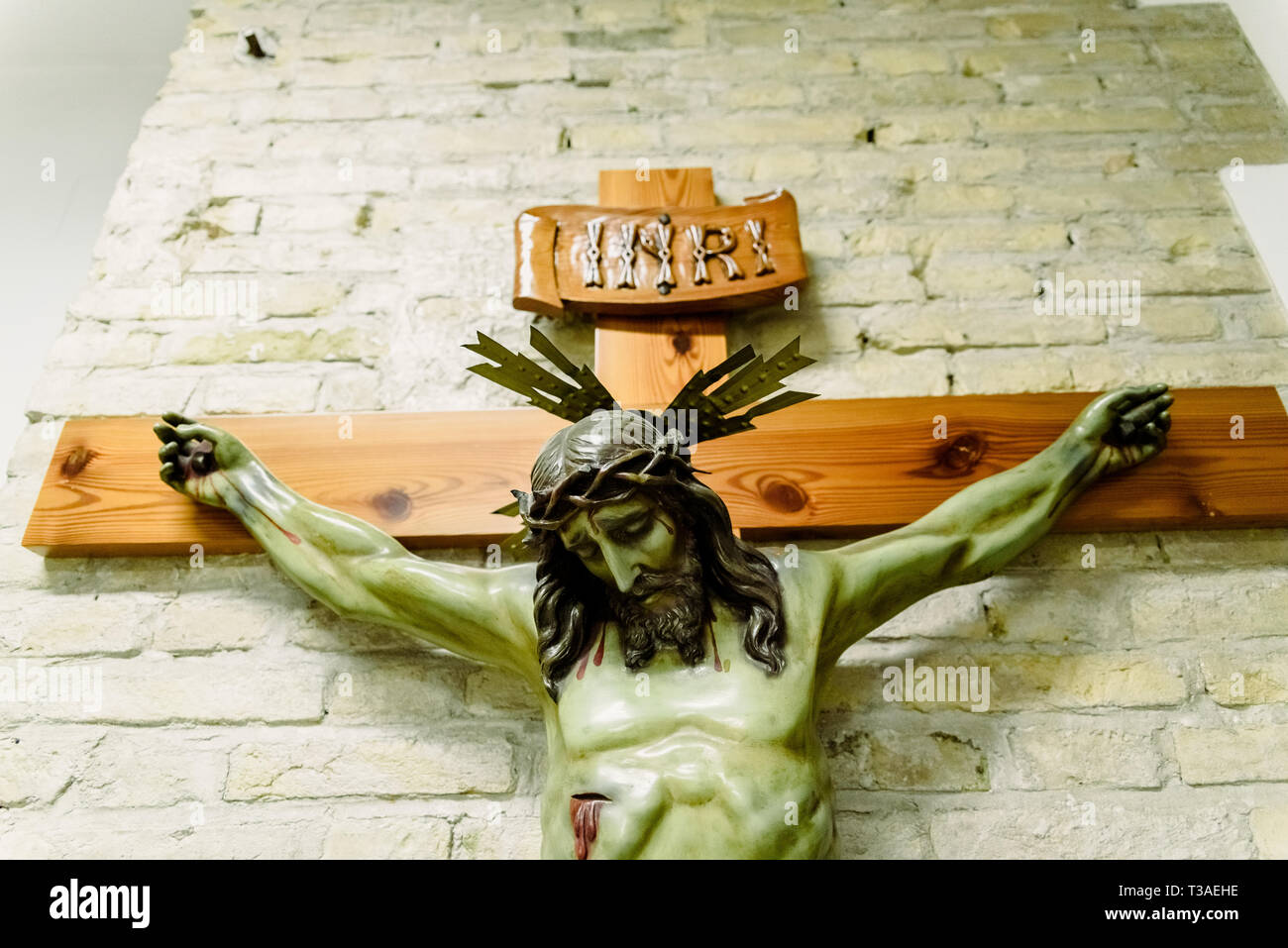 Valencia, Spain - March 30, 2019: Detail of a carved crucifix with the ...