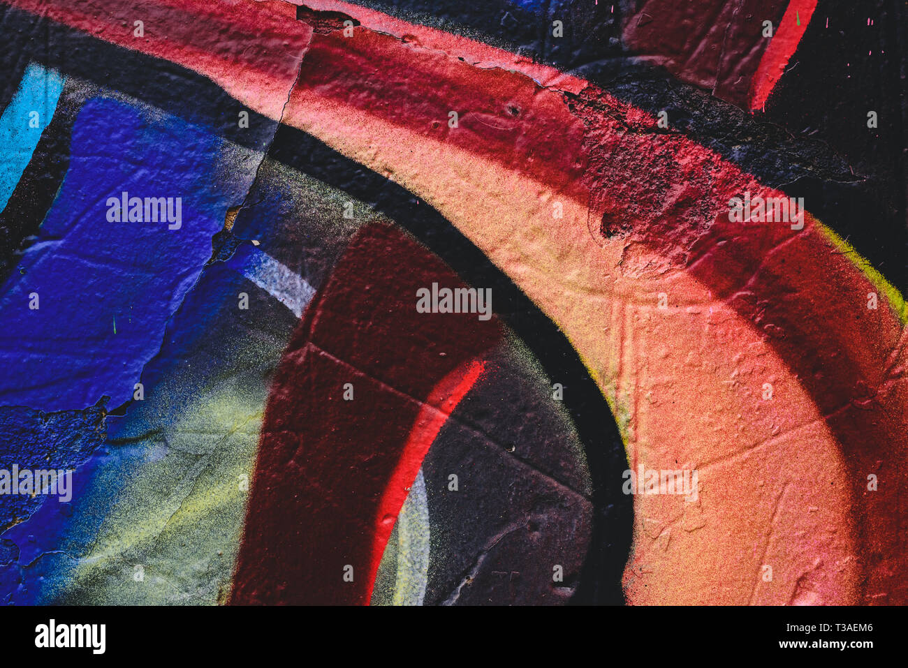 Detail of an anonymous street graffiti with many colors, cheerful urban ...