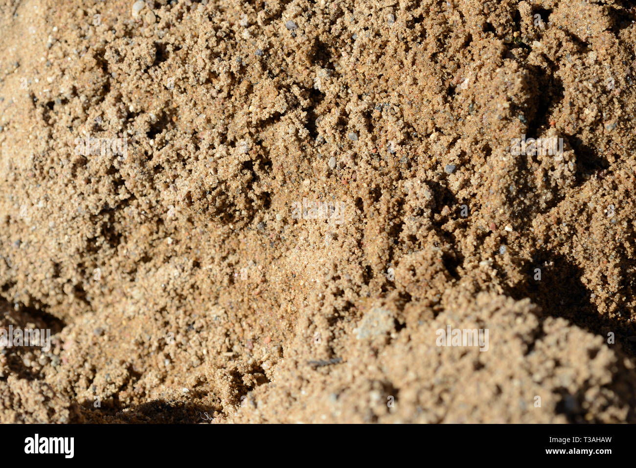 Texture of sand. Construction sand close up background Stock Photo - Alamy