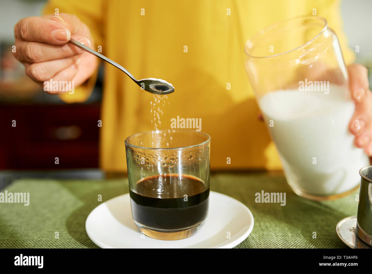 Adding sugar in water hi-res stock photography and images - Alamy