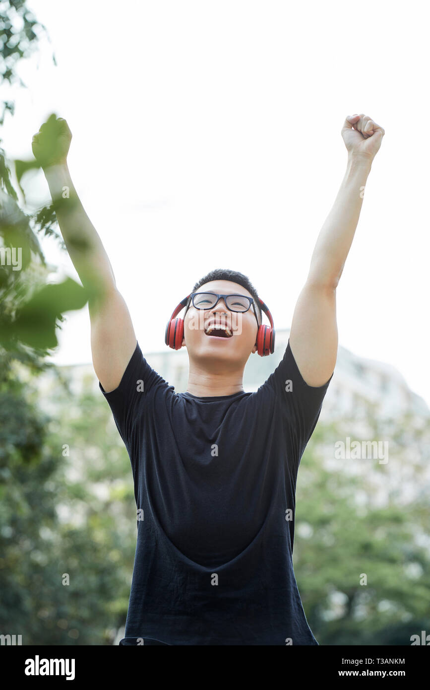 Happy excited man Stock Photo - Alamy
