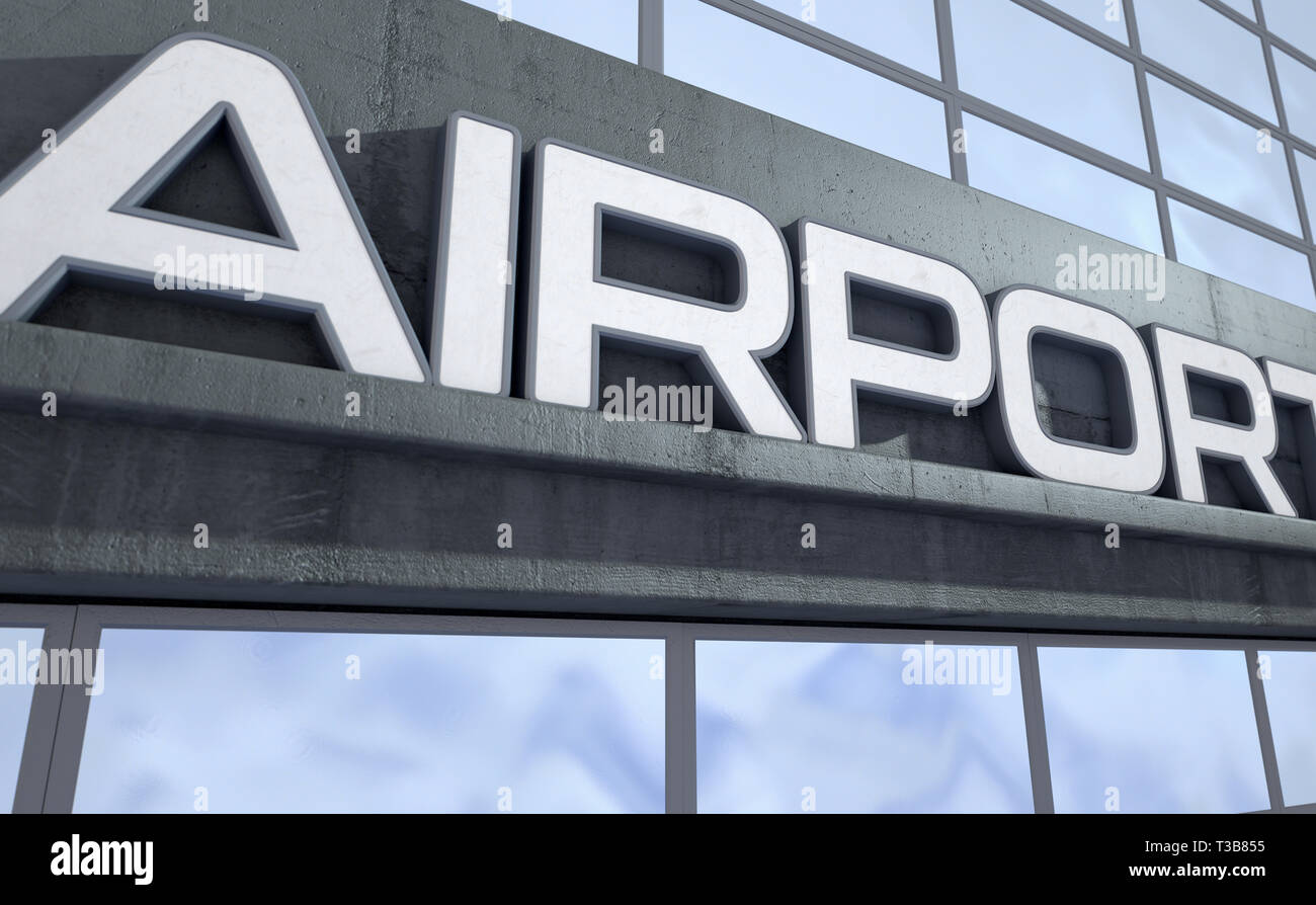 Signage above the entrance to a modern generic airport building made of ...
