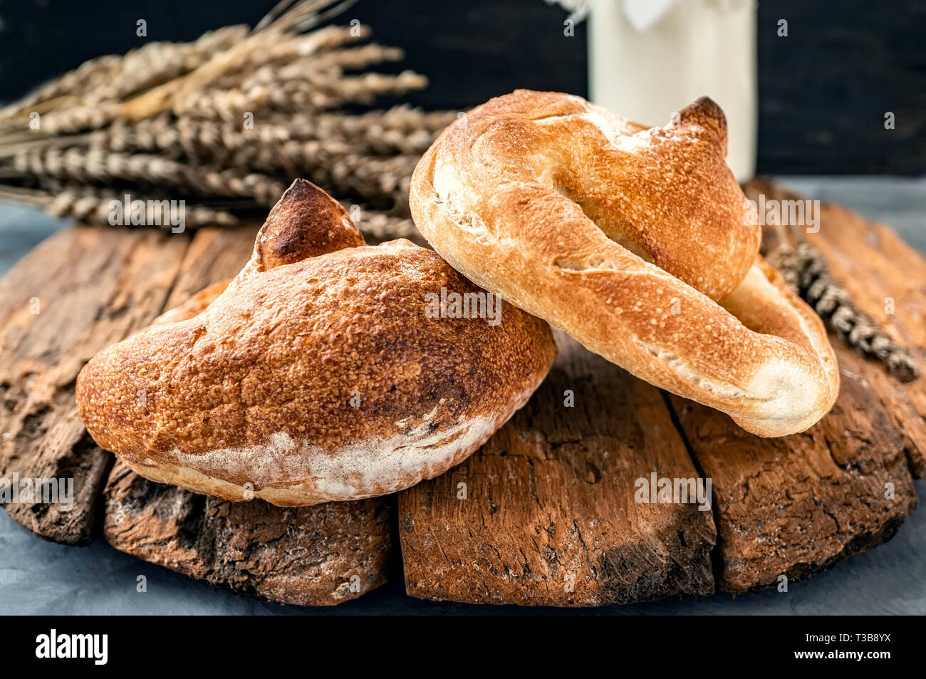 Russian national bread Kalach on a wooden background. National bread ...
