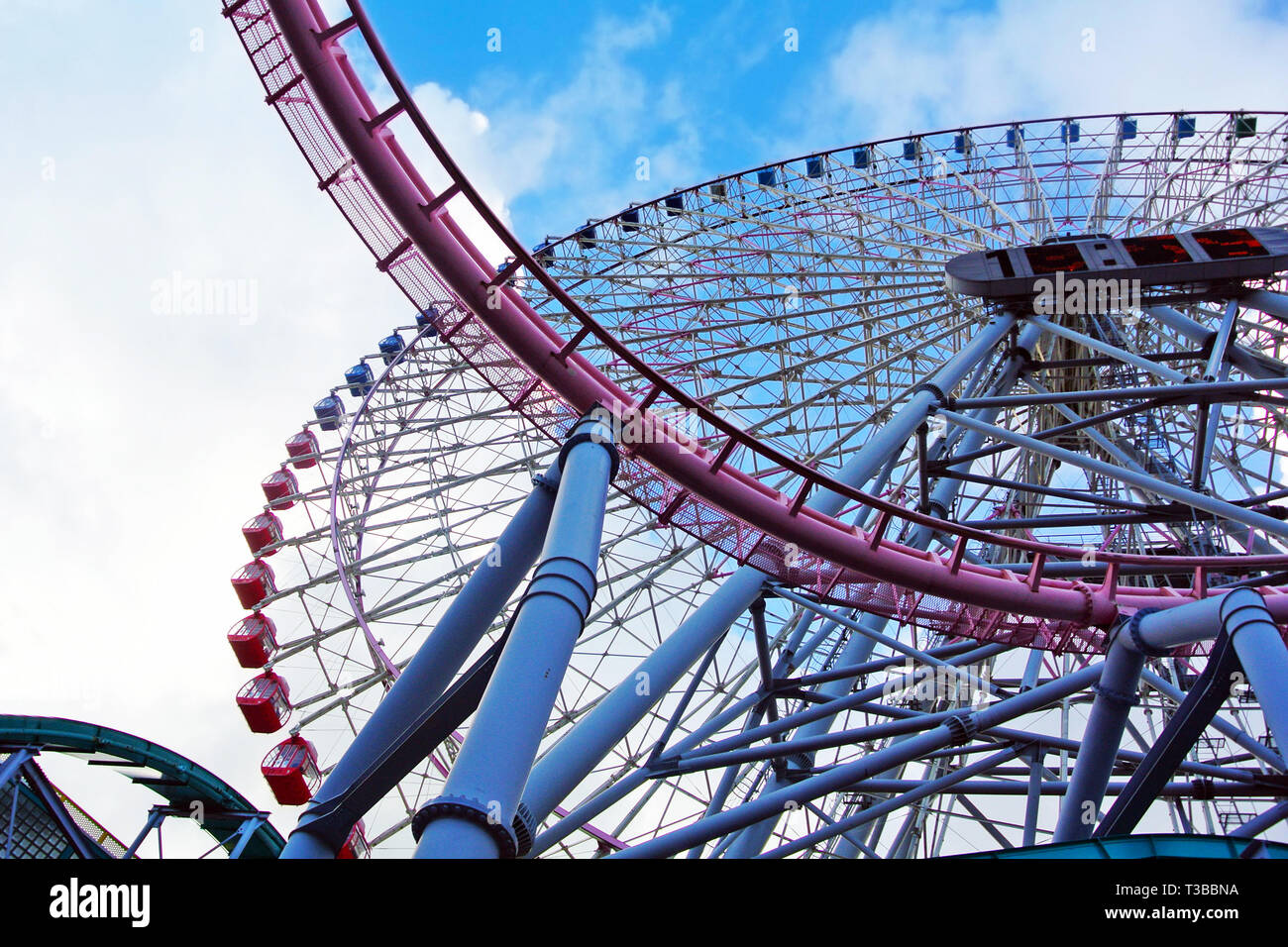 Giant ferris wheel called "Cosmo Clock 21" at Cosmo World amusement ...