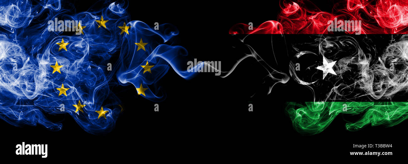 European Union vs Libya, Libyan smoke flags placed side by side. Thick ...