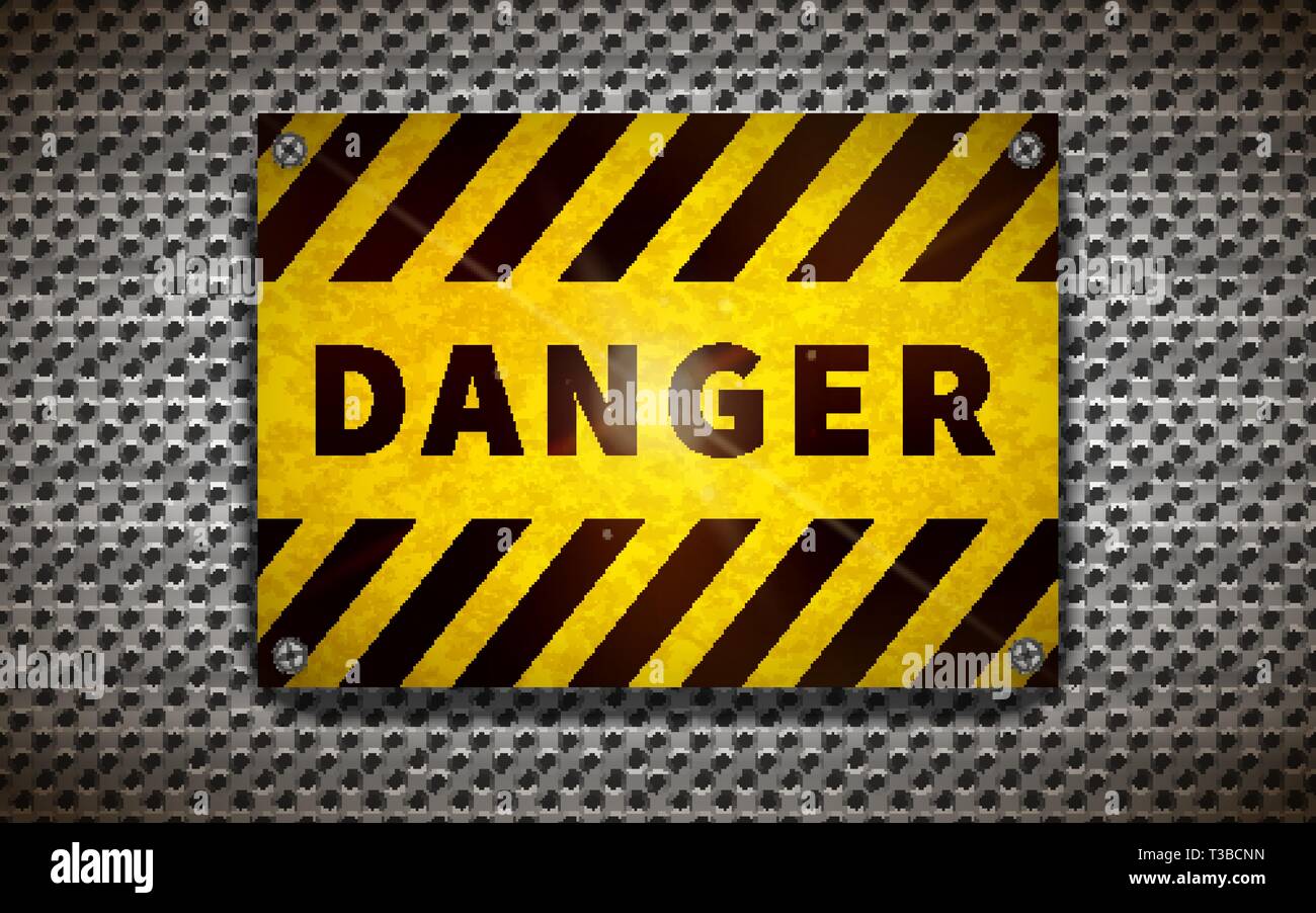 Bright yellow danger plate on metallic grid, industrial background ...