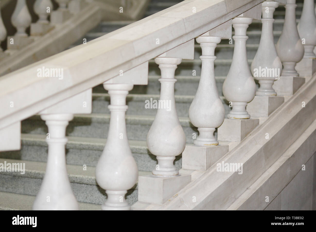 Marble white staircase. Ancient style in architecture Stock Photo - Alamy